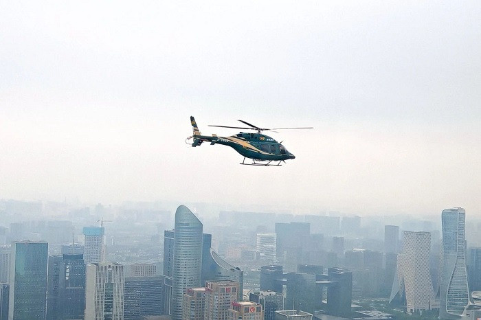 First low-altitude helicopter tour over Hangzhou's Qiantang River takes ...